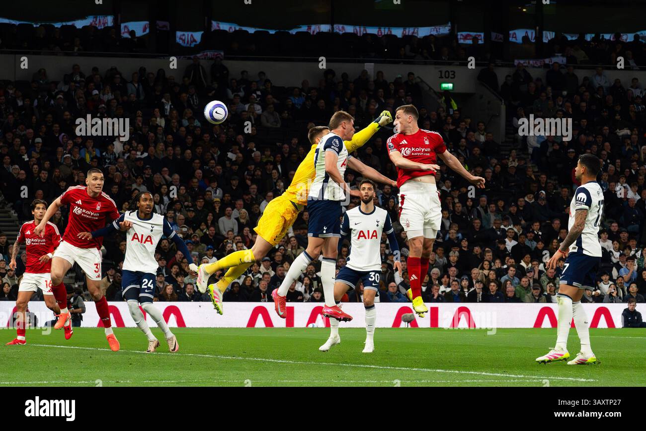 London, UK. 21st Apr, 2025. Chris Wood of Nottingham Forest heads and ...