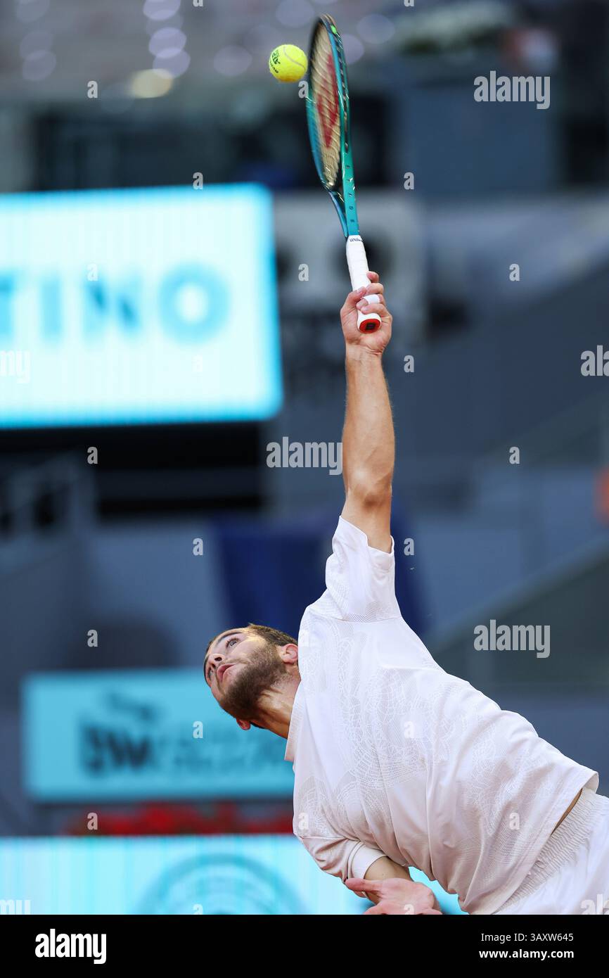 Hugo Gaston of France in action against Yannick Hanfmann of Germany ...