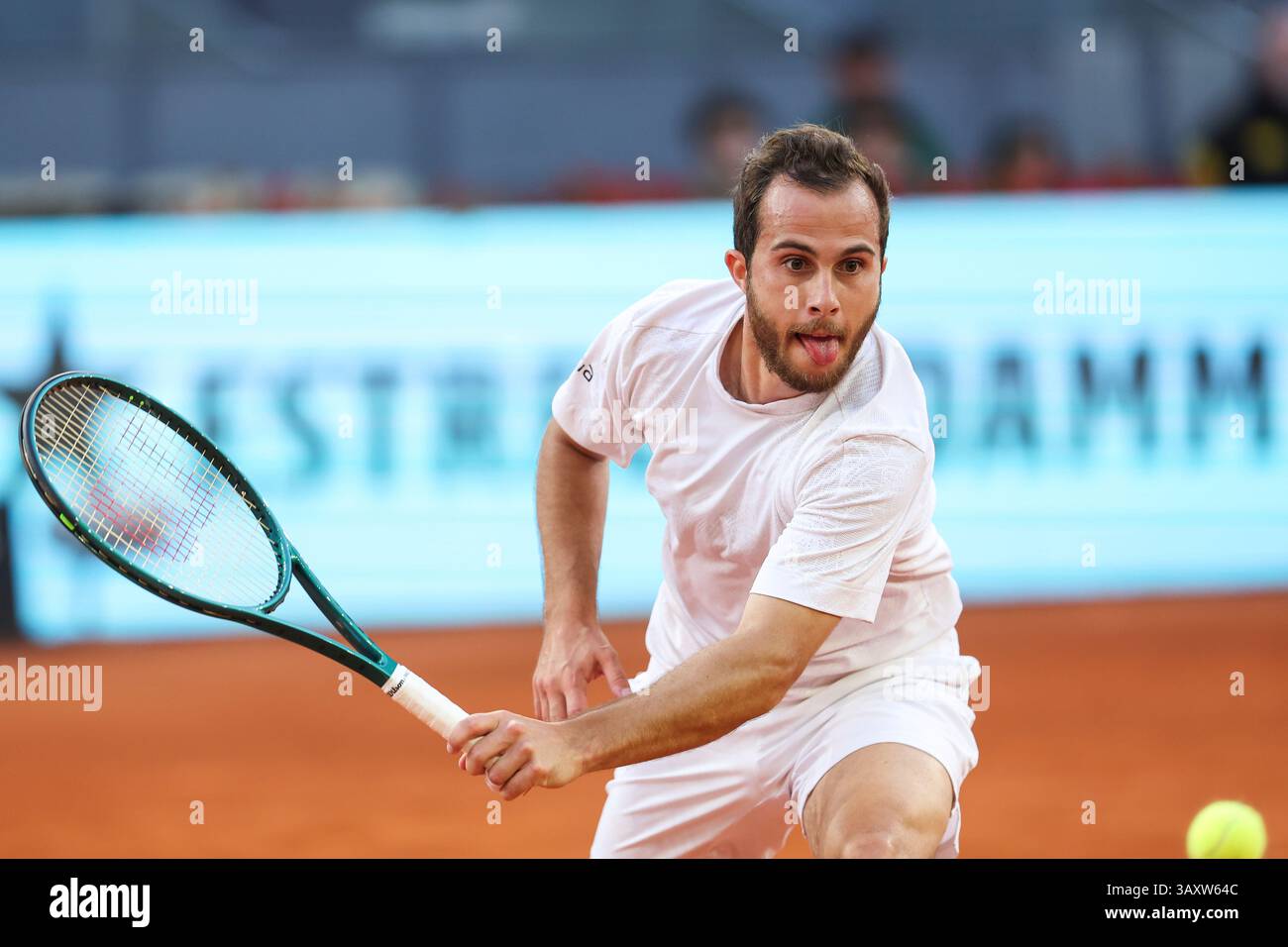 Hugo Gaston of France in action against Yannick Hanfmann of Germany ...