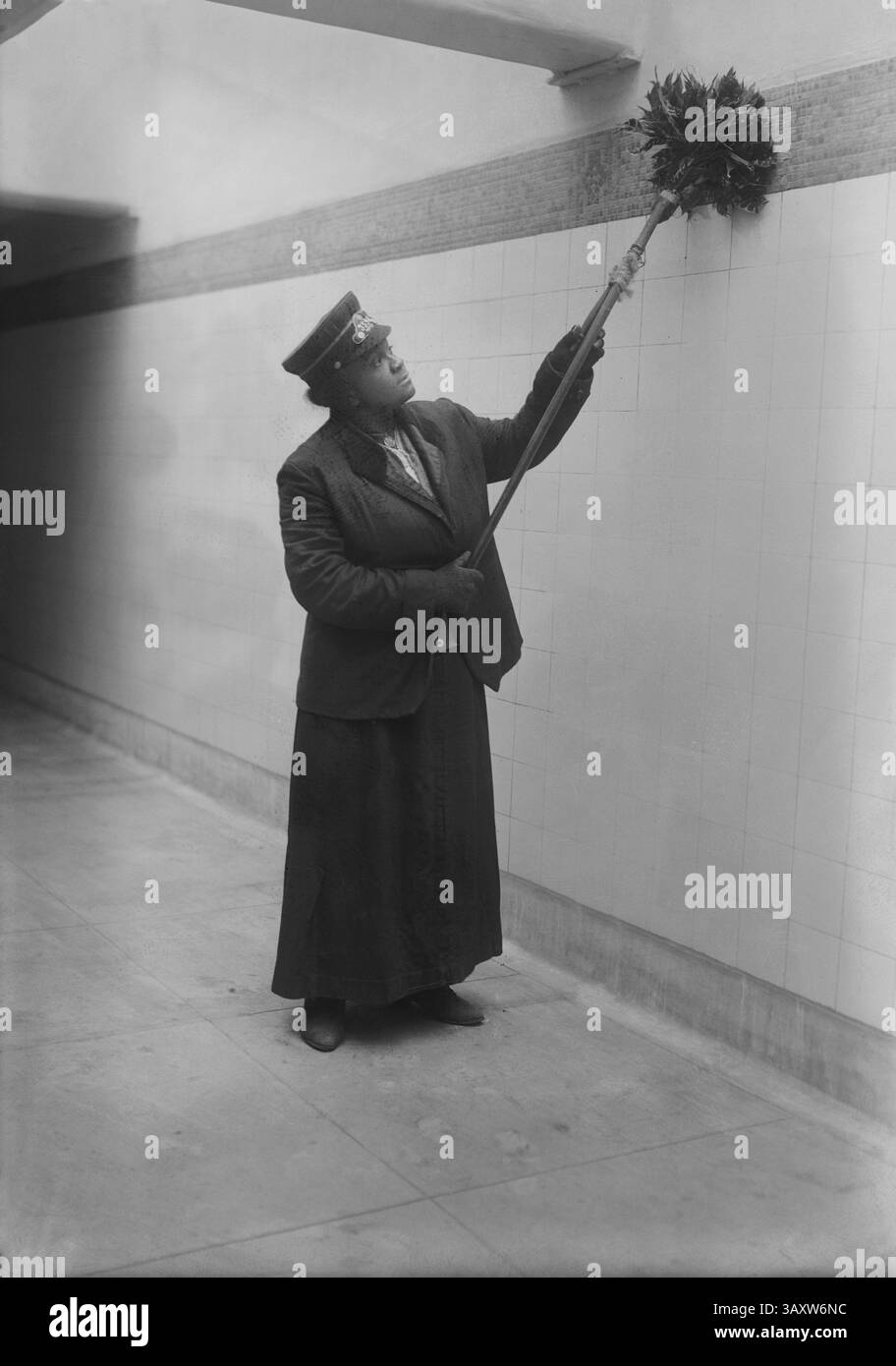 August 3, 2016 - Subway Porter with Duster at Subway Station, New York ...