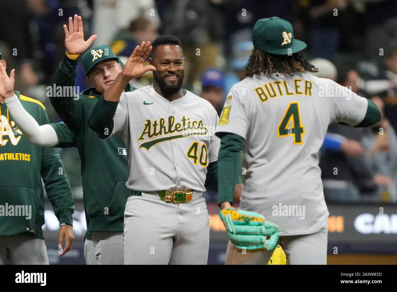Athletics' Luis Severino celebrates with Lawrence Butler after a ...