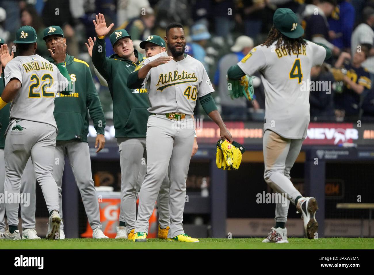 Athletics' Luis Severino celebrates with Lawrence Butler after a ...