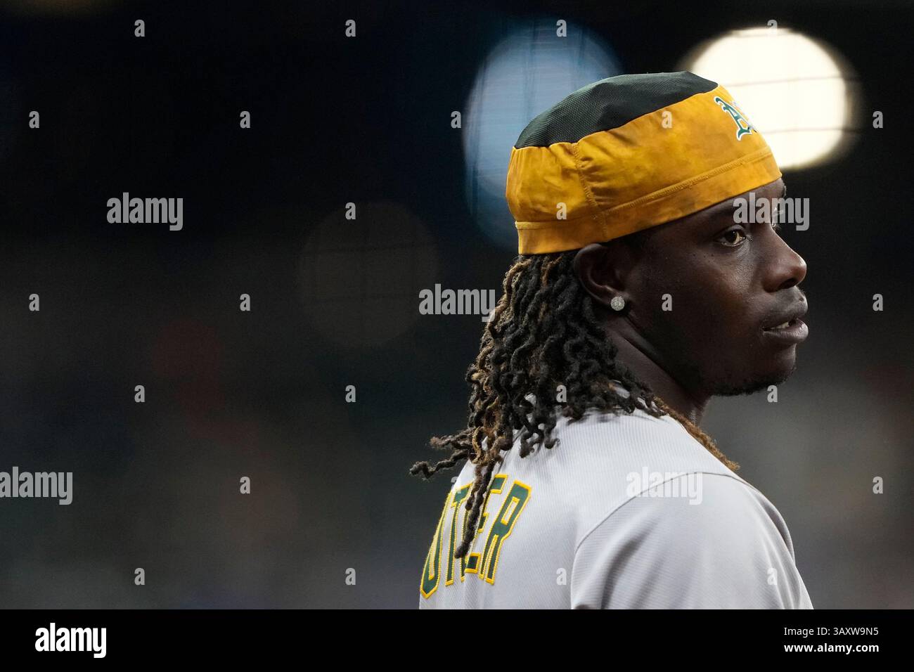 Athletics' Lawrence Butler looks on during the fifth inning of a ...