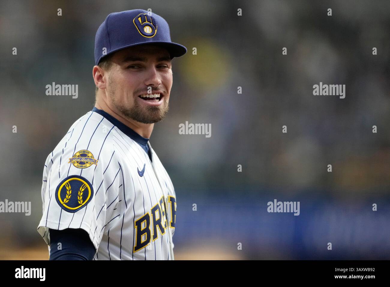 Milwaukee Brewers' Caleb Durbin smiles during the first inning of a ...