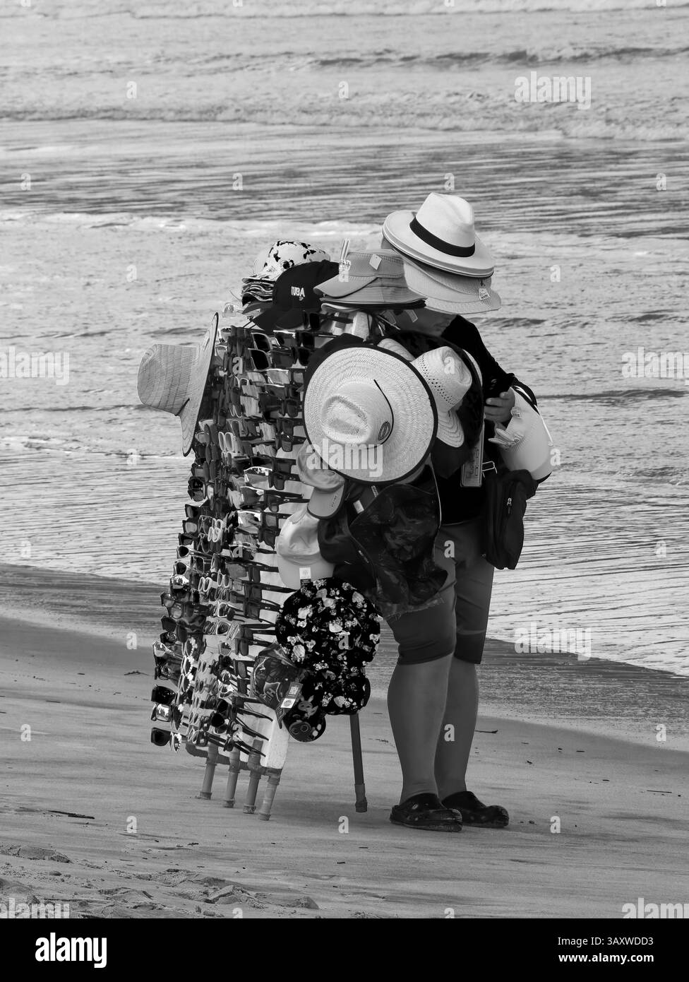 Beach Trader snoozing Stock Photo - Alamy