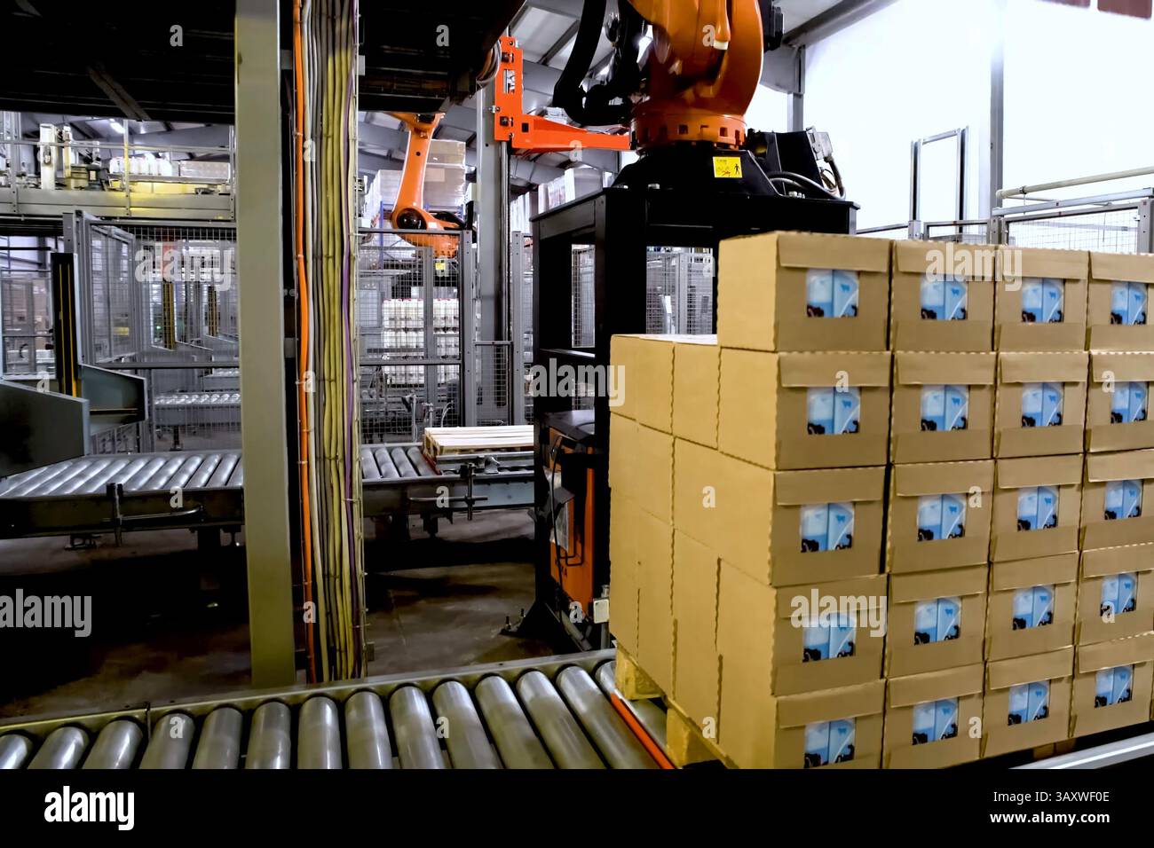 Milk package assembly line hi-res stock photography and images - Alamy