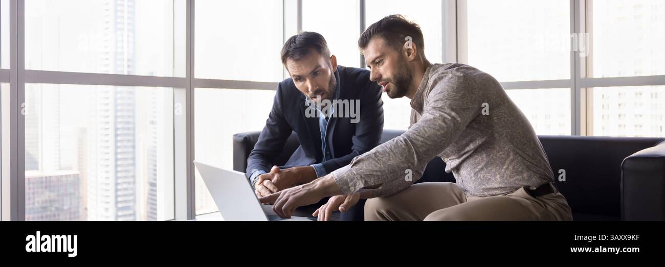 Two businessmen reviewing data hi-res stock photography and images - Alamy