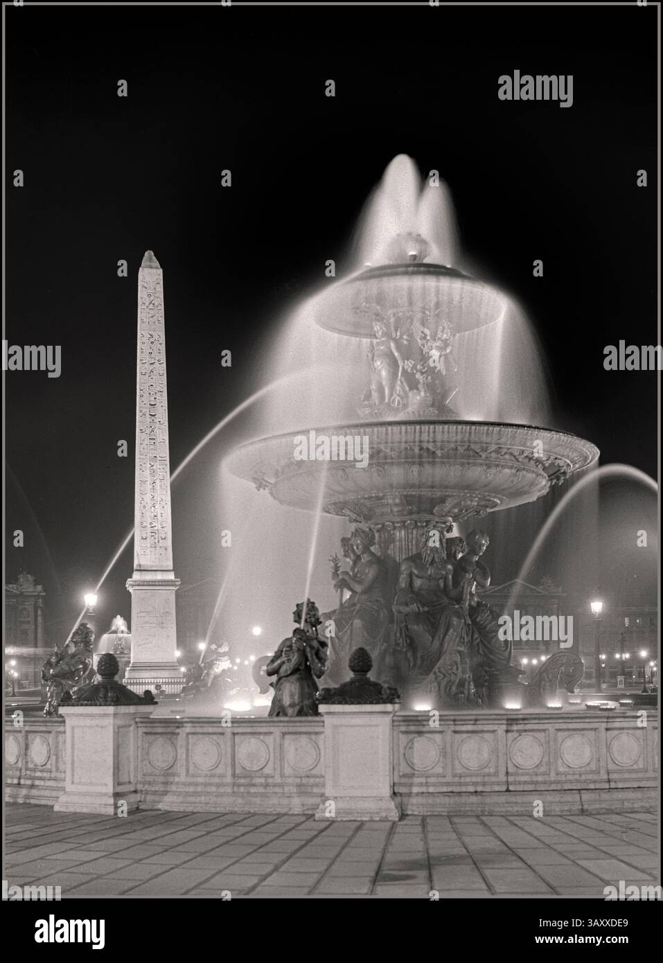 Vintage retro Paris Fountains night fountain and obelisk on the Place ...