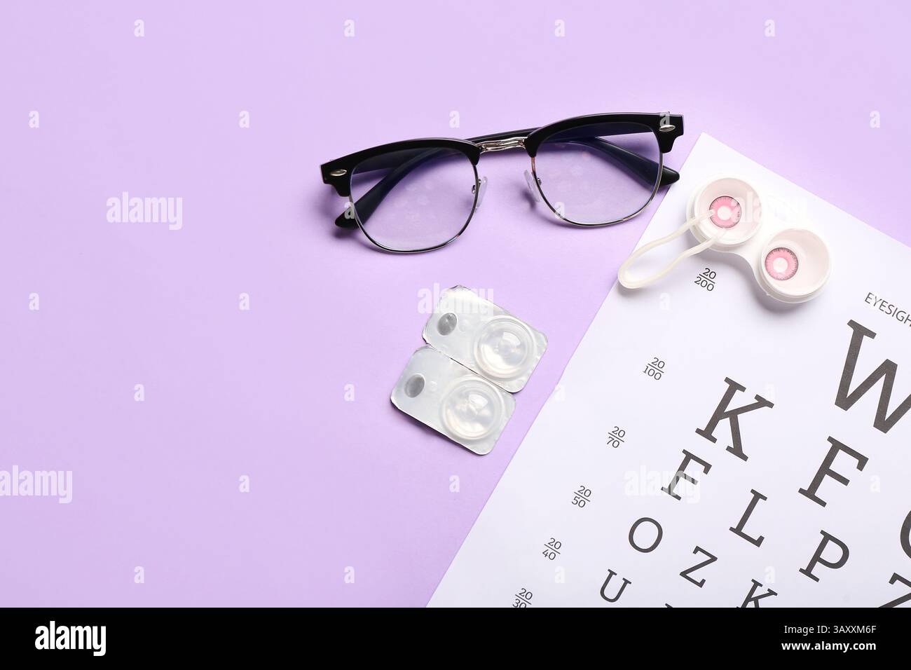Eyeglasses with eye test chart and container for contact lenses on ...