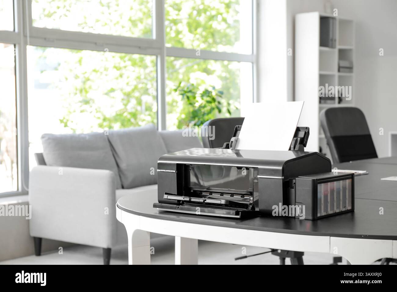 Modern printer printing documents hi-res stock photography and images ...