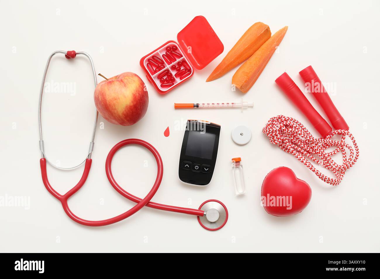 Glucometer with glucose sensor, stethoscope, heart and food on white ...
