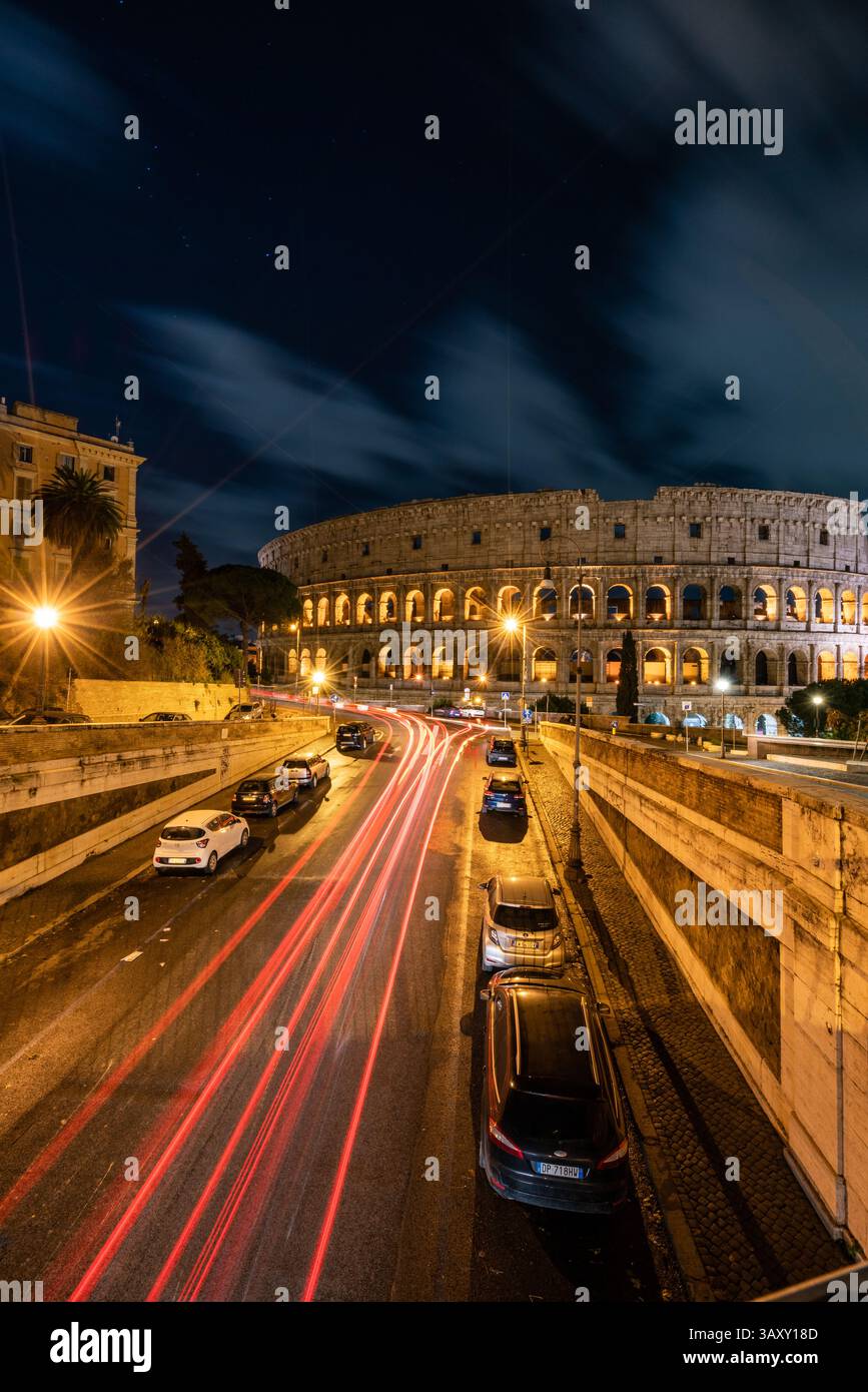 Nighttime View of the Colosseum in Rome with Light Trails Stock Photo ...