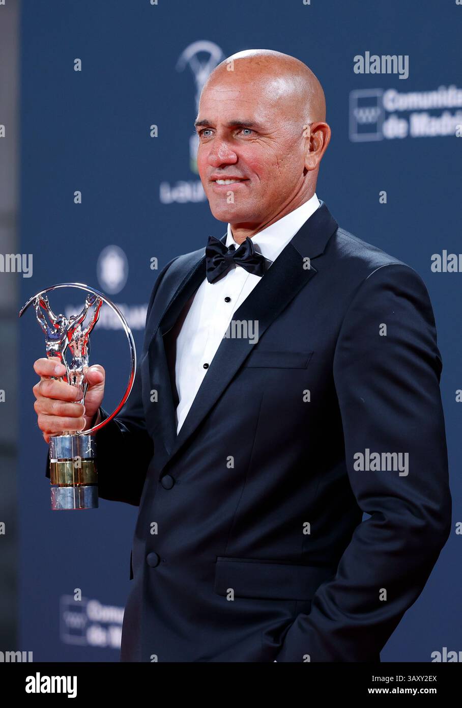 Kelly Slater poses with the award during the Laureus World Sports ...