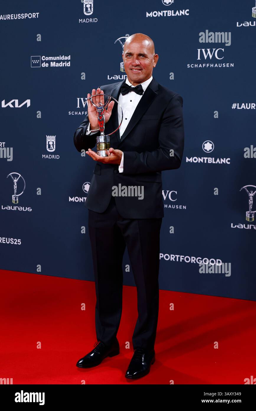 Kelly Slater poses with the award during the Laureus World Sports ...