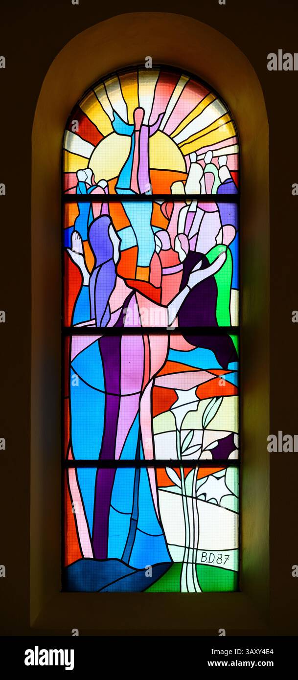 The Ascension of Jesus into Heaven. A stained-glass window in the St ...