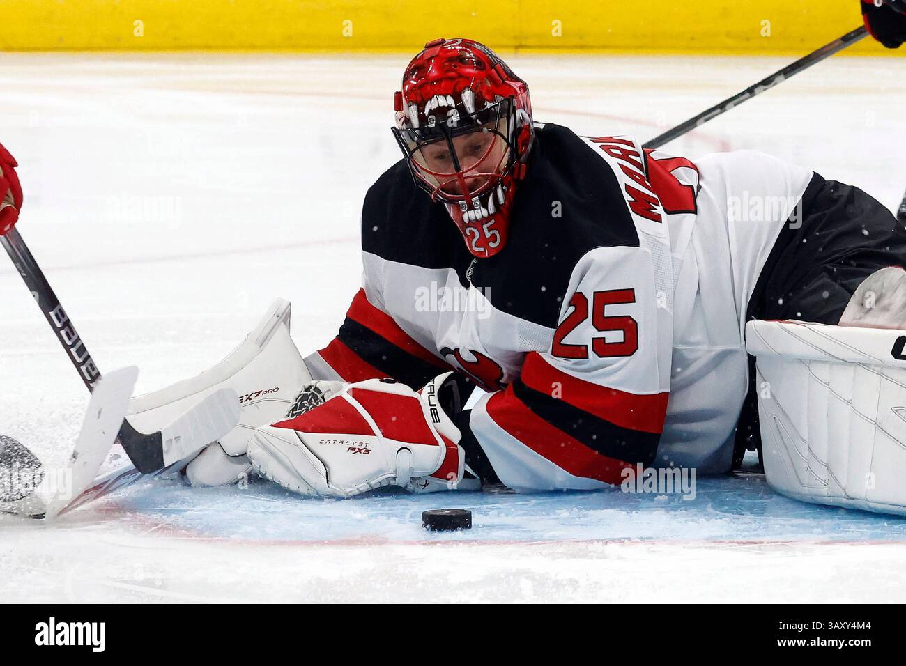 New Jersey Devils goaltender Jacob Markstrom (25) watches the puck ...