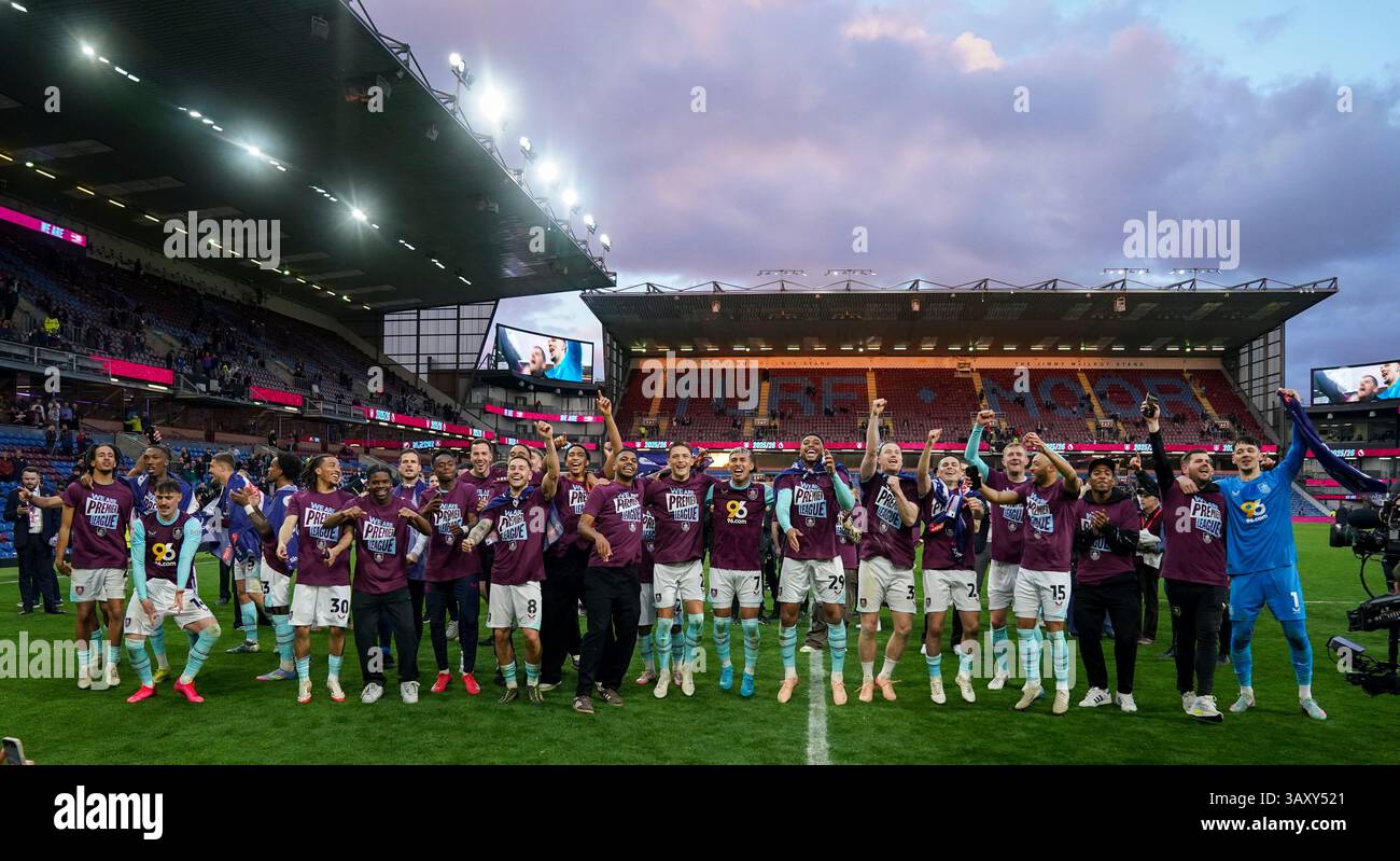 Burnley, UK. 21st Apr, 2025. Burnley players celebrate winning ...