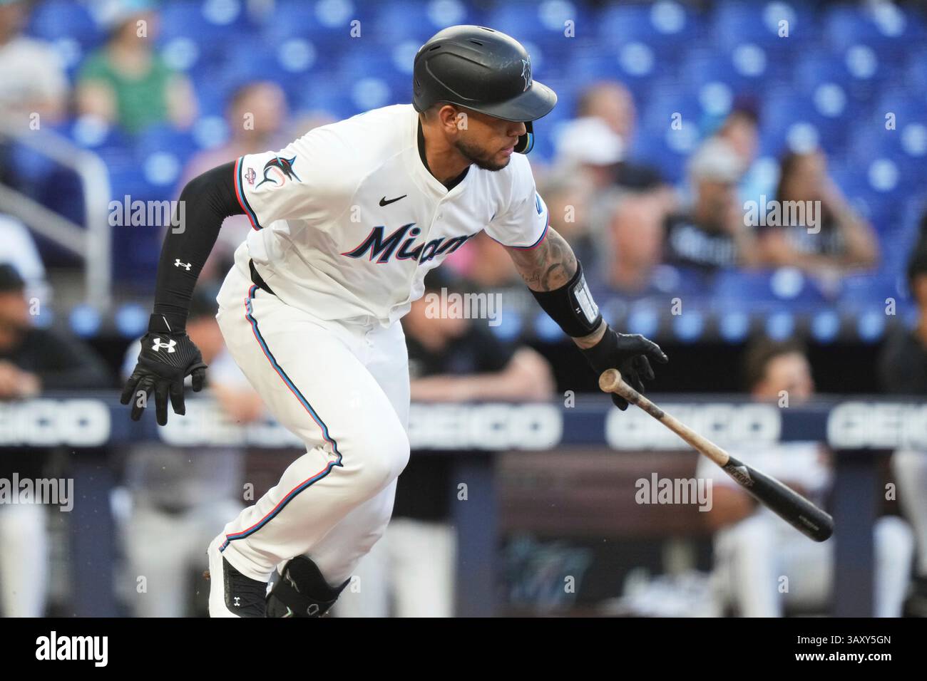 Miami Marlins' Agustin Ramirez drops his bat after hitting a single ...