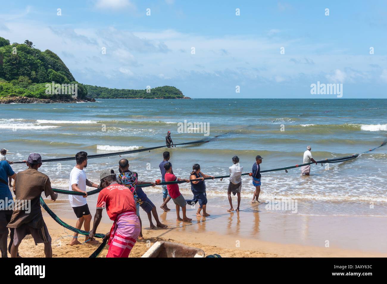 Galle, Sri Lanka - September 14 2024; Two men coming in through small ...