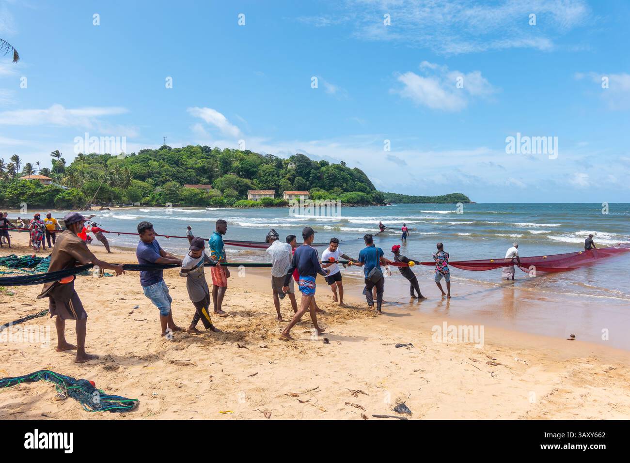 Galle, Sri Lanka - September 14 2024; Two men coming in through small ...