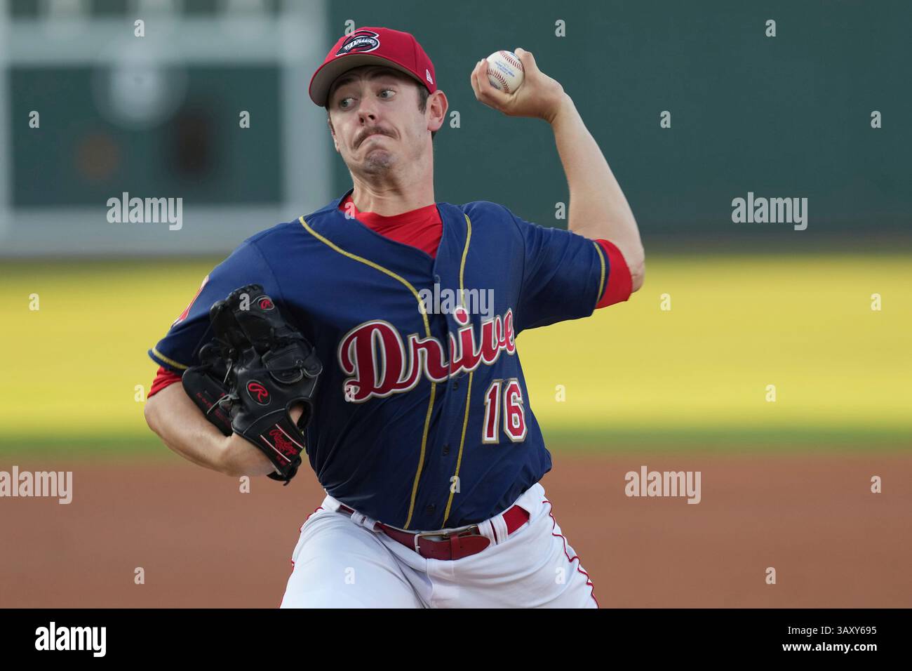 Hayden Mullins (16) of the Greenville Drive delivers a pitch in a South ...