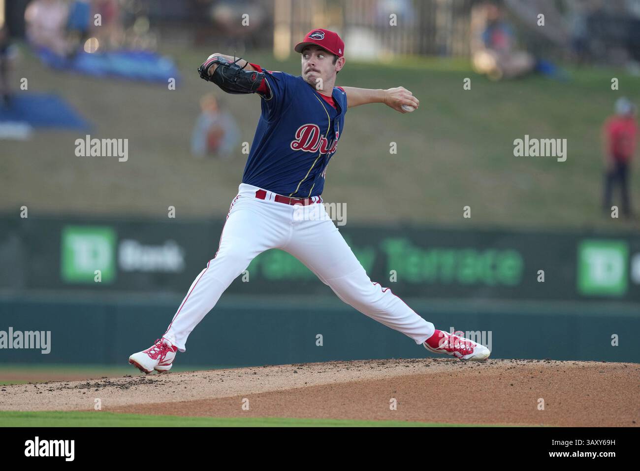 Hayden Mullins (16) of the Greenville Drive delivers a pitch in a South ...