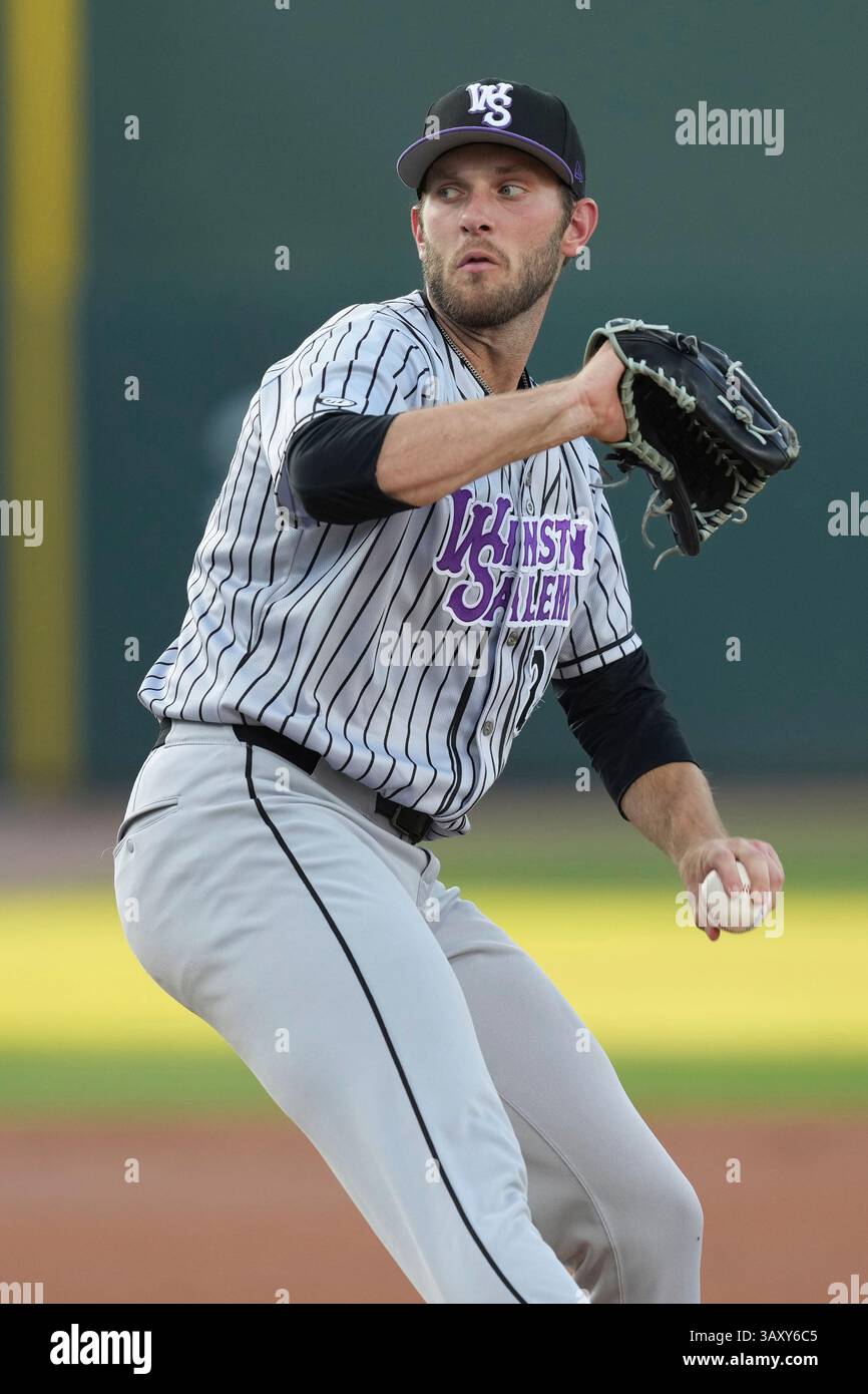 Shane Murphy (20) of the Winston-Salem Dash delivers a pitch in a South ...