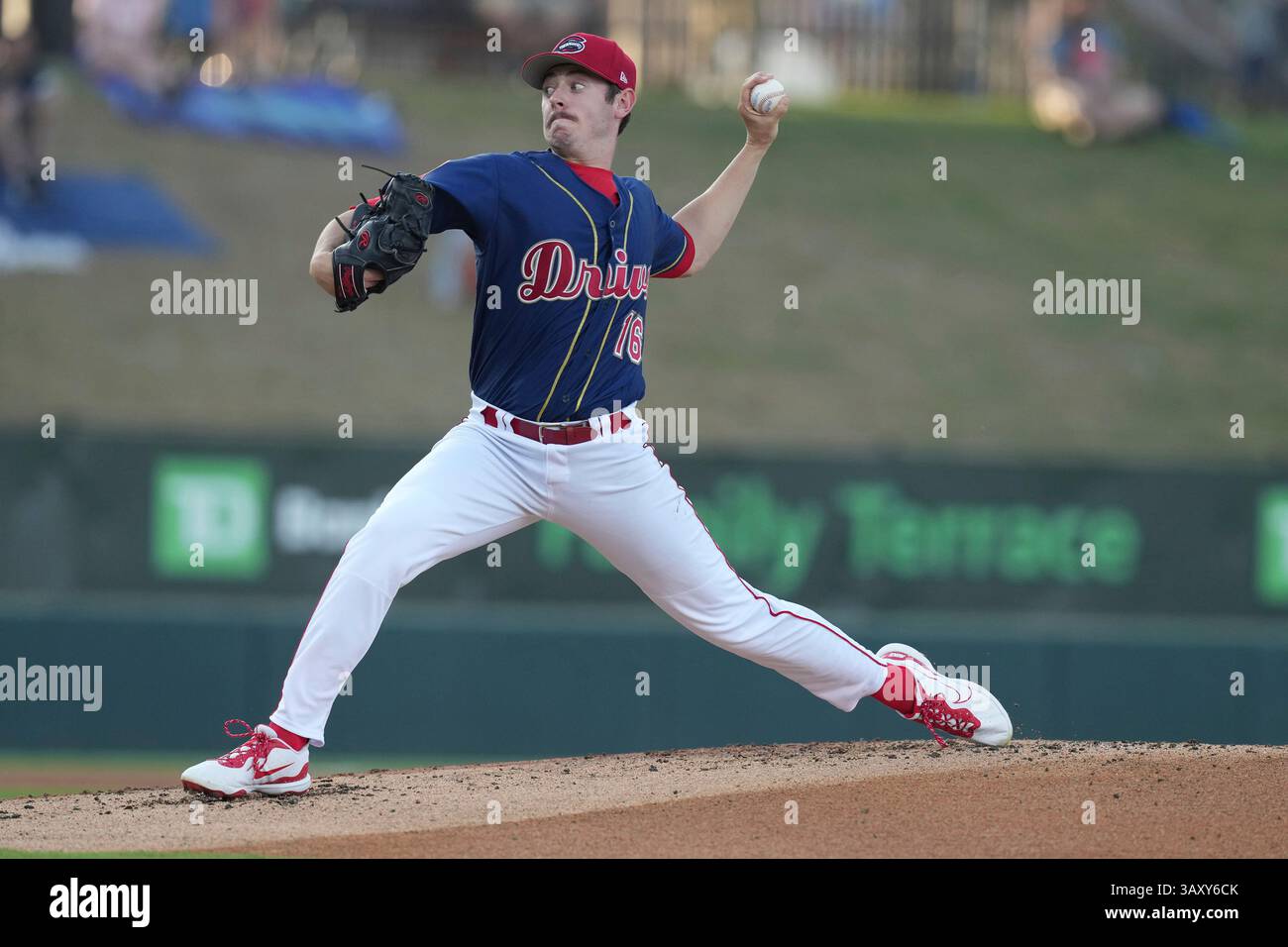 Hayden Mullins (16) of the Greenville Drive delivers a pitch in a South ...