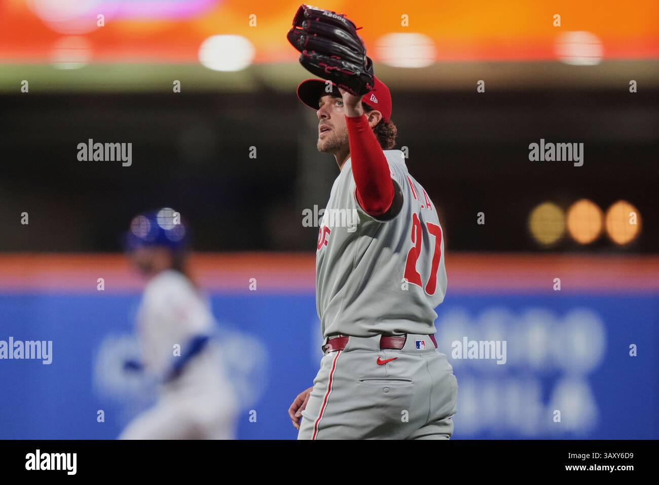 Philadelphia Phillies pitcher Aaron Nola (27) reacts as New York Mets ...