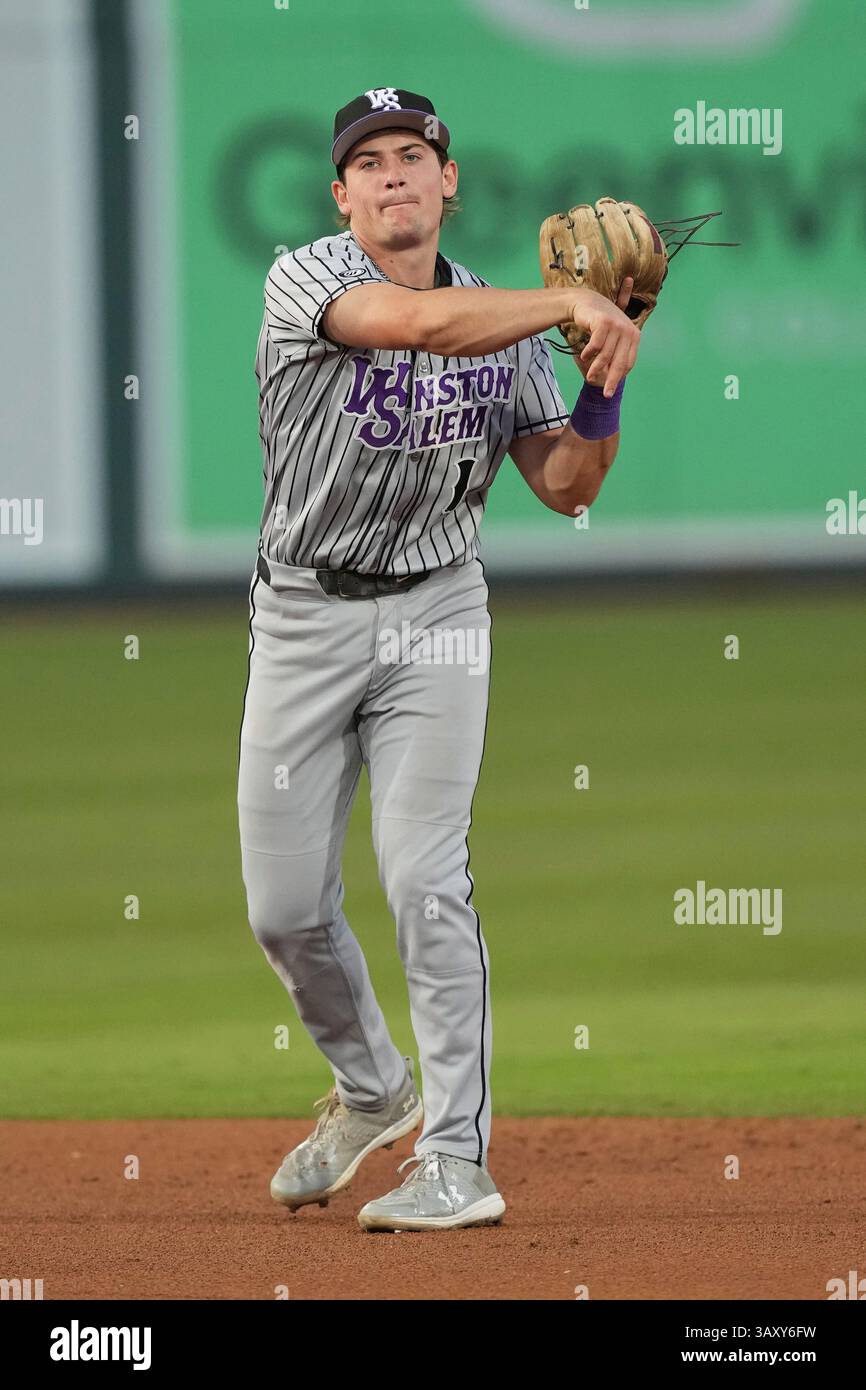 Sam Antonacci (1) of the Winston-Salem Dash warms up between innings of ...
