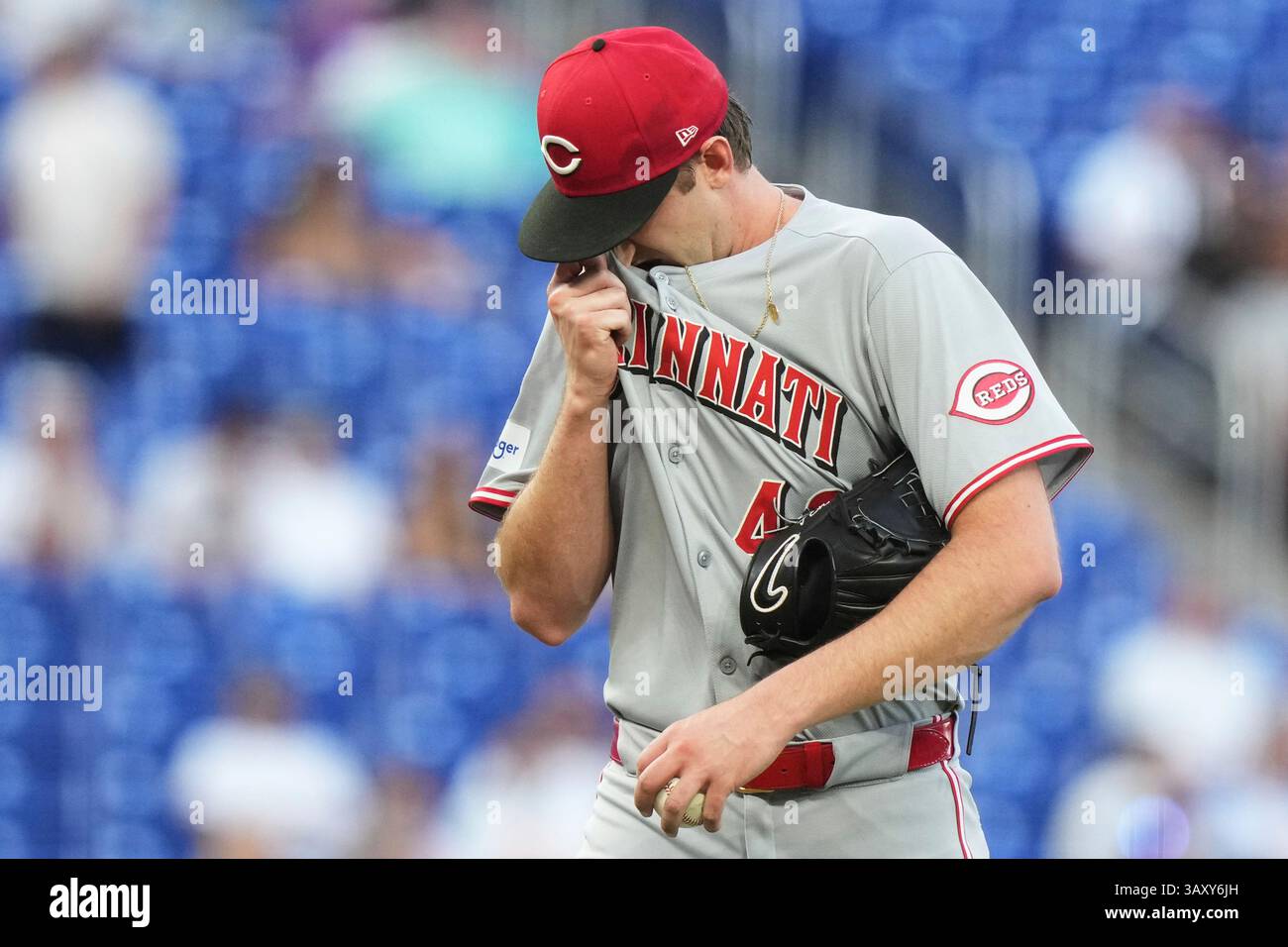 Cincinnati Reds starting pitcher Nick Lodolo stands on the mound during ...