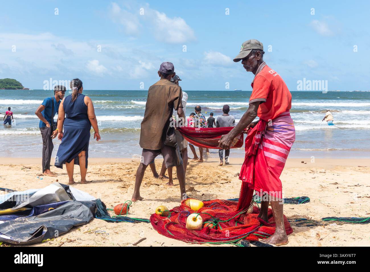 Galle, Sri Lanka - September 14 2024; Two men coming in through small ...