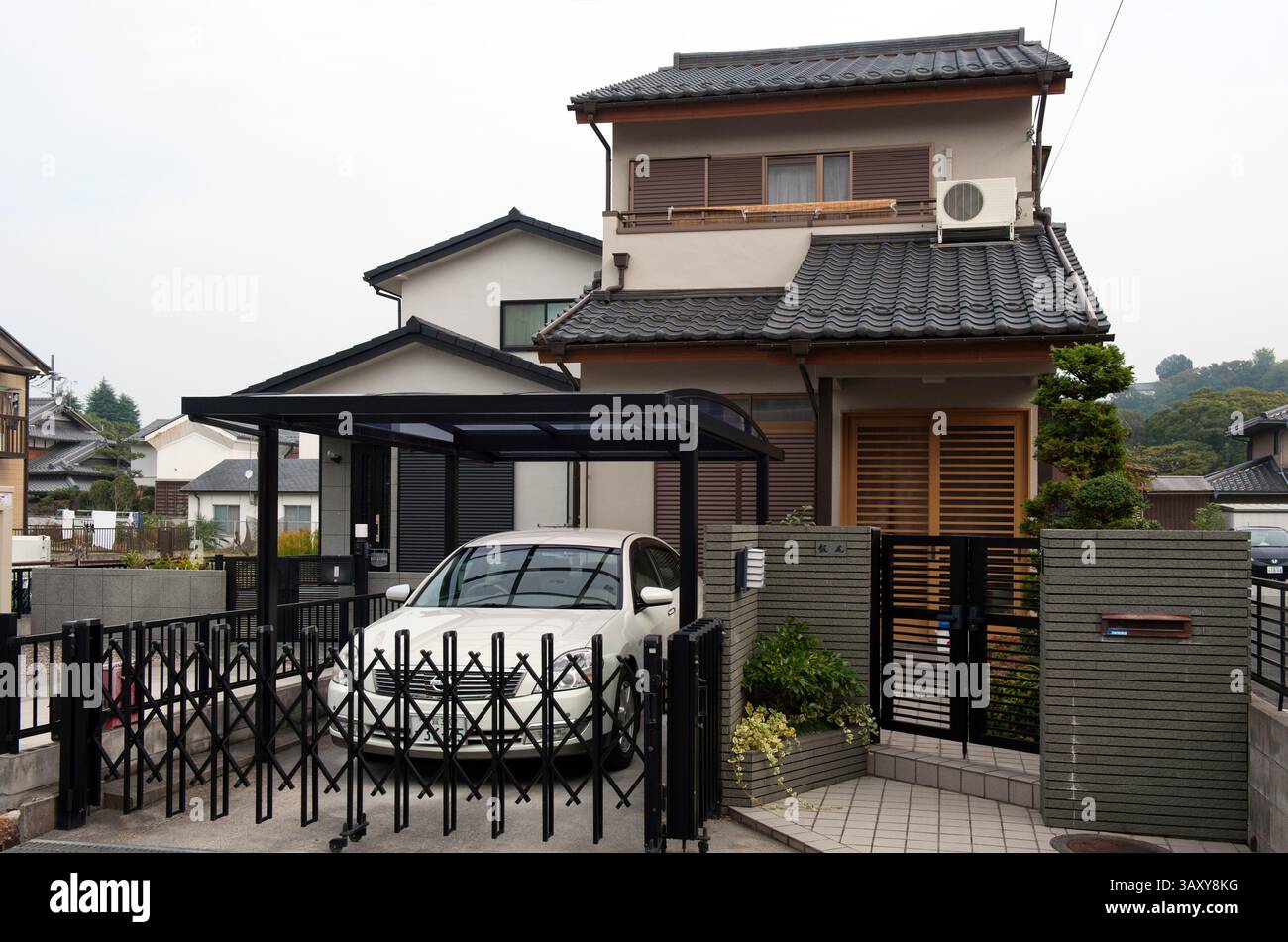 A typical Japanese middle-class, single-family, two-story residence in ...