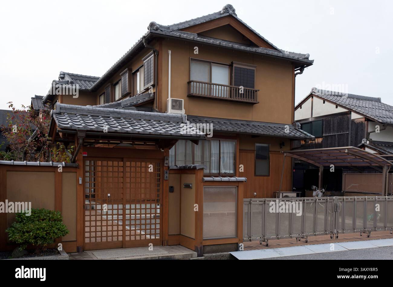 A typical Japanese middle-class, single-family, two-story residence in ...
