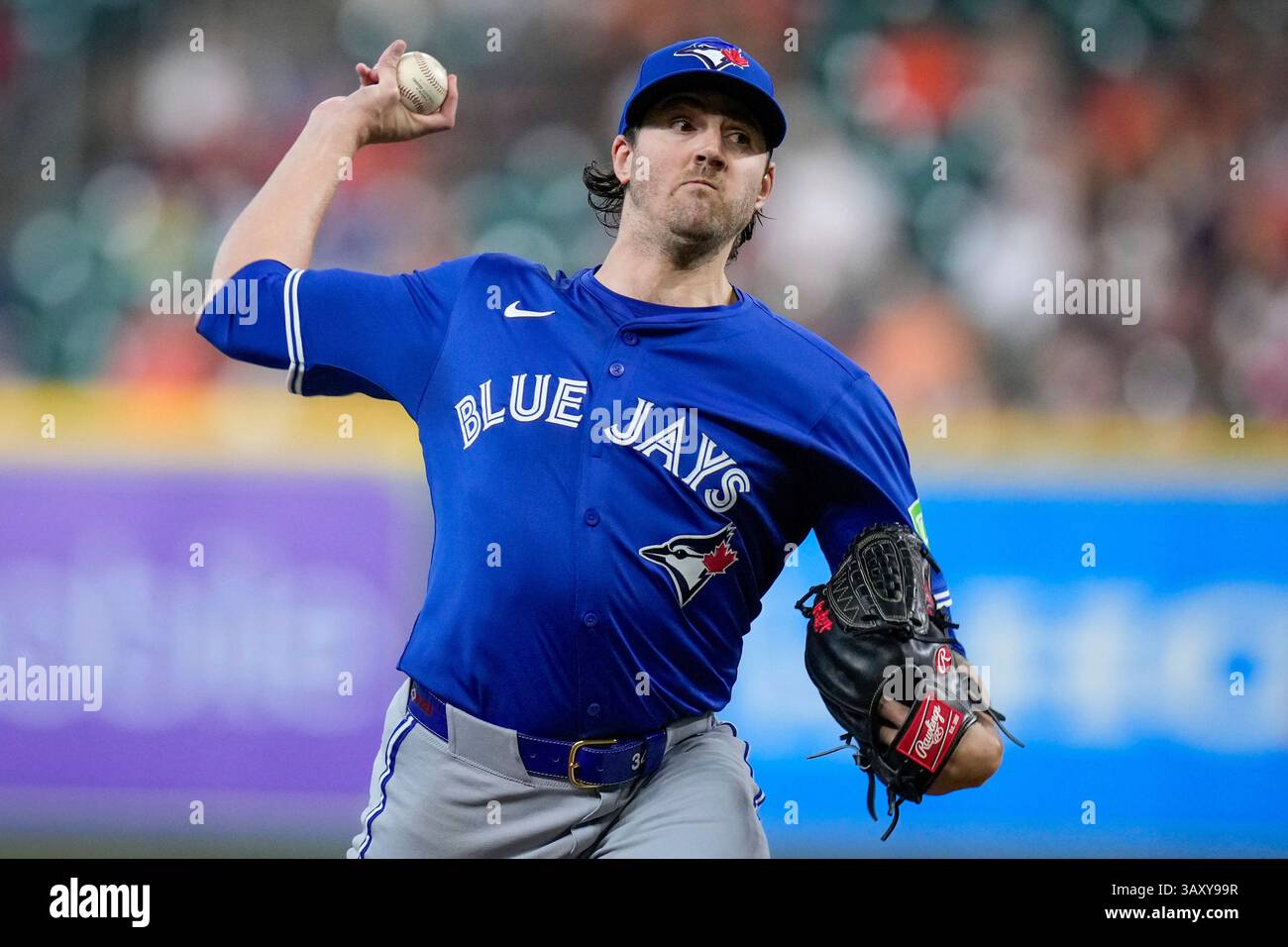 Toronto Blue Jays starting pitcher Kevin Gausman (34) delivers against the Houston Astros during ...