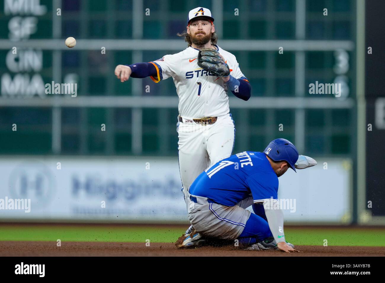 Houston Astros second baseman Brendan Rodgers (1) completes a double ...