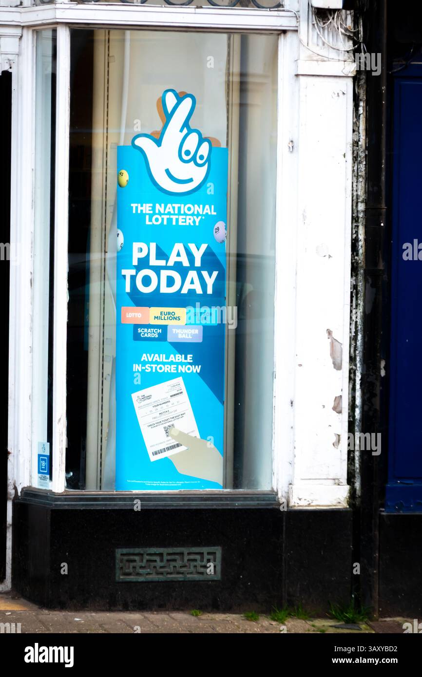 A sign in a shop window advertises the National Lottery in Saffron ...