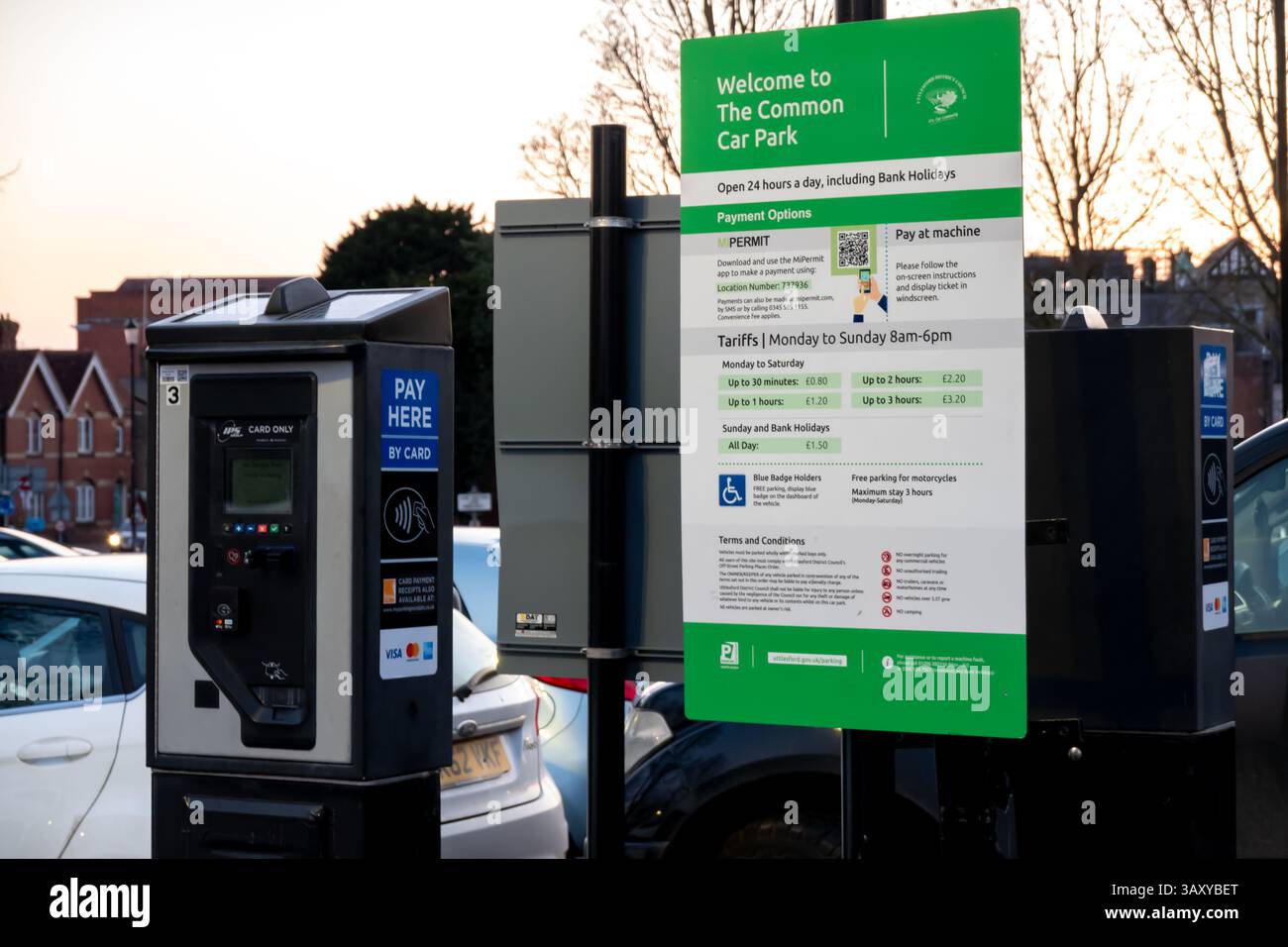 A car park sign and payment machine in Saffron Walden, Essex, UK. It ...