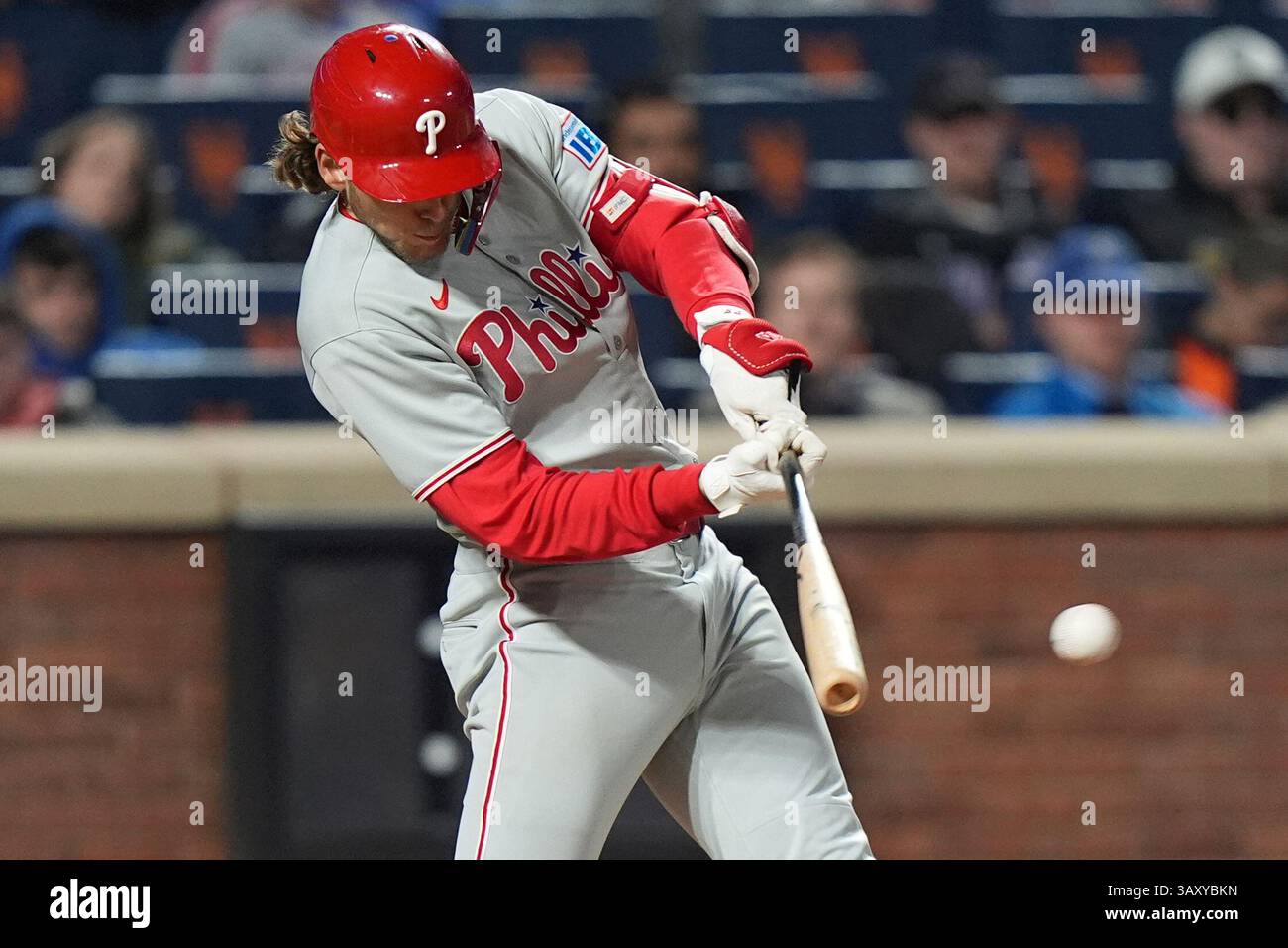 Philadelphia Phillies' Alec Bohm hits a single during the ninth inning ...