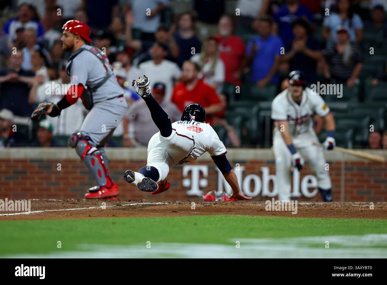 ATLANTA, GA - APRIL 21: Pinch runner Eli White #36 of the Atlanta ...