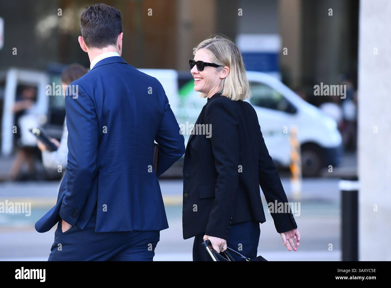 Defence barrister Ruth O'Gorman (middle) leaves the Brisbane Supreme ...