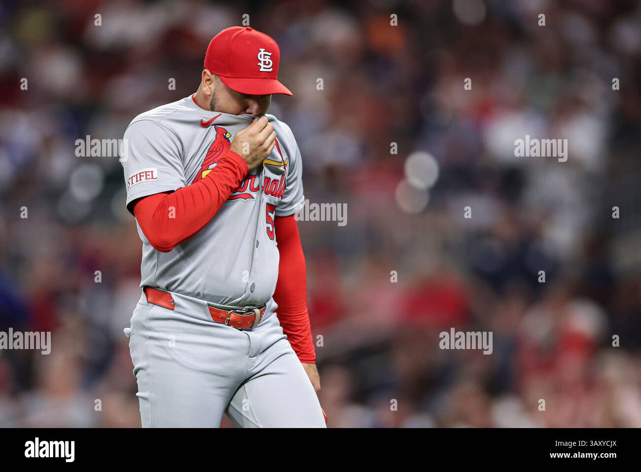 St. Louis Cardinals pitcher JoJo Romero walks off the field after ...