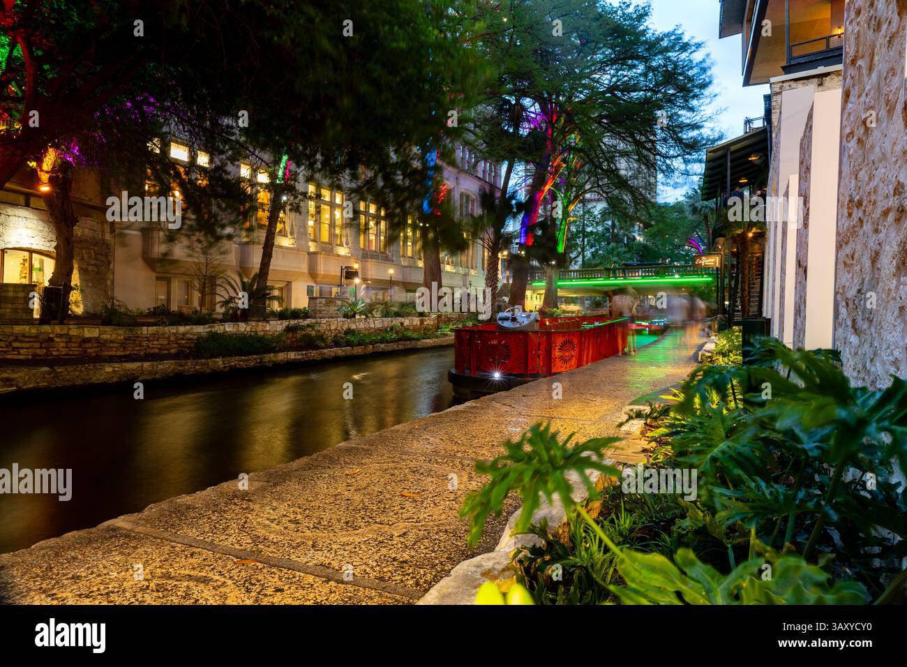 San Antonio, TX - April 4, 2025: People dine and walk along San Antonio's famed Riverwalk as ...