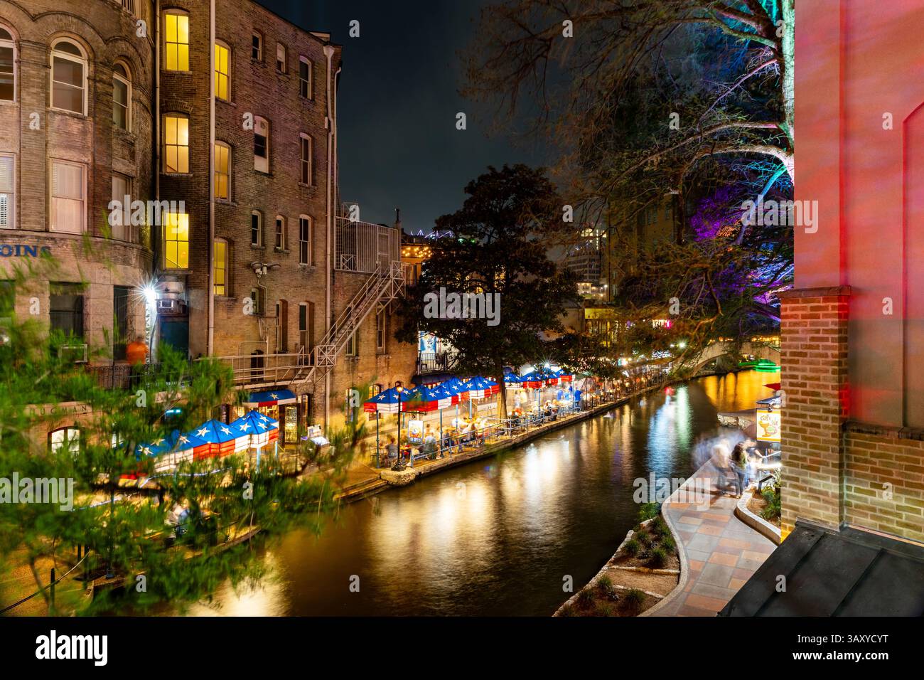 San Antonio, TX - April 4, 2025: People dine and walk along San Antonio's famed Riverwalk as ...