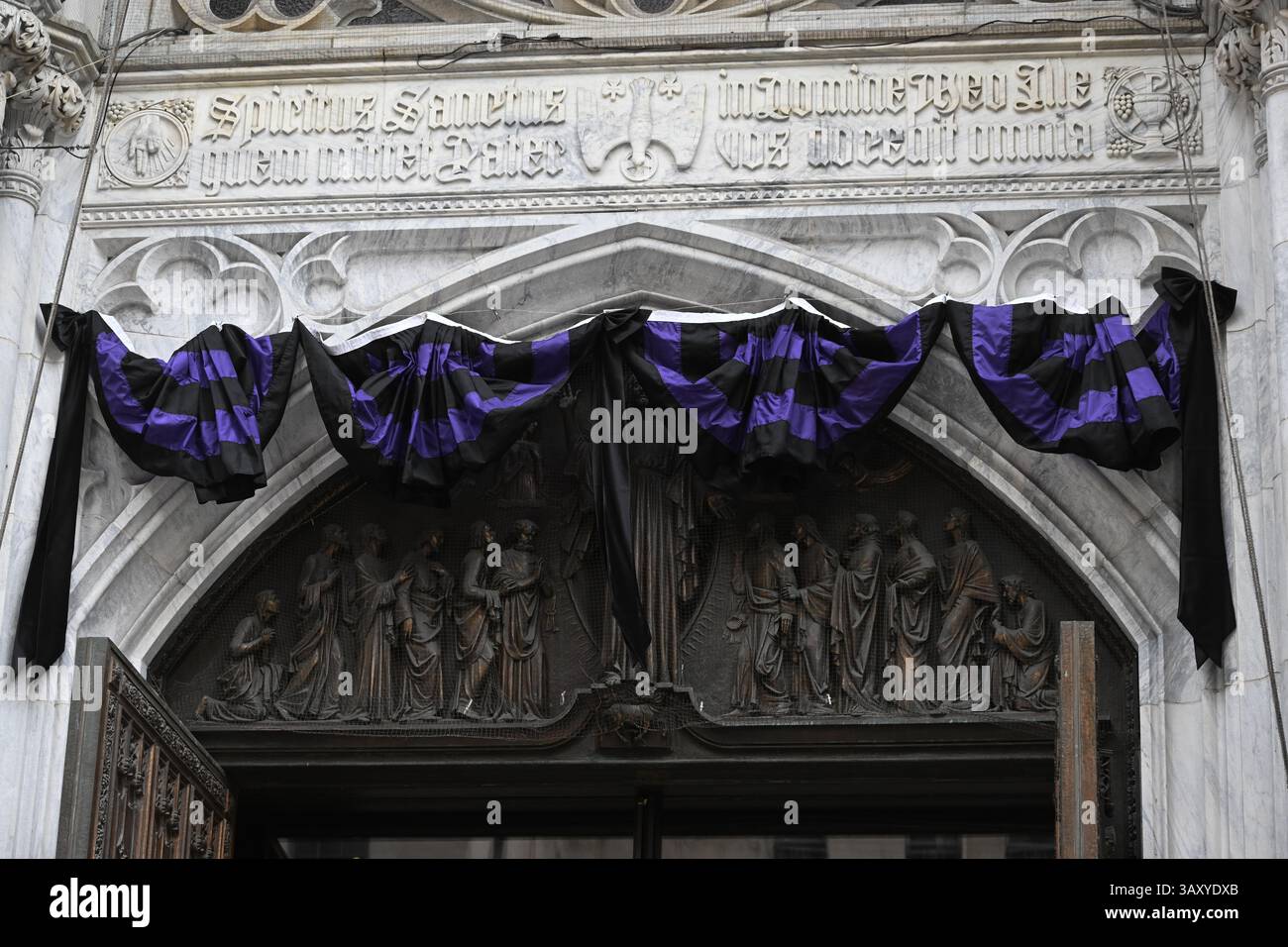 A purple banner hangs over the entrance of St. Patricks Cathedral in ...