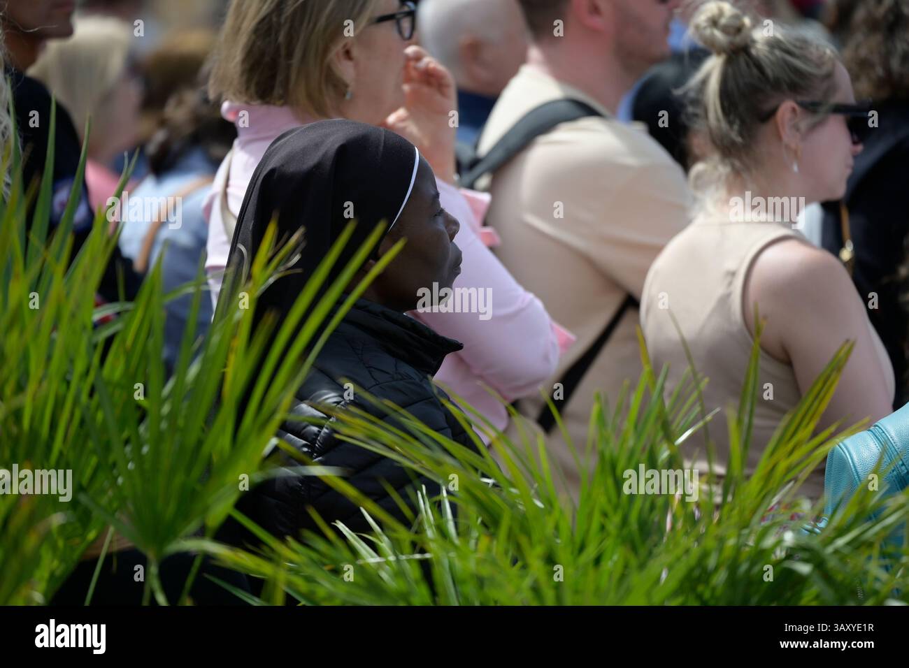 Rome, Italy. 21st Apr, 2025. The faithful gather at St. Peter's Square ...