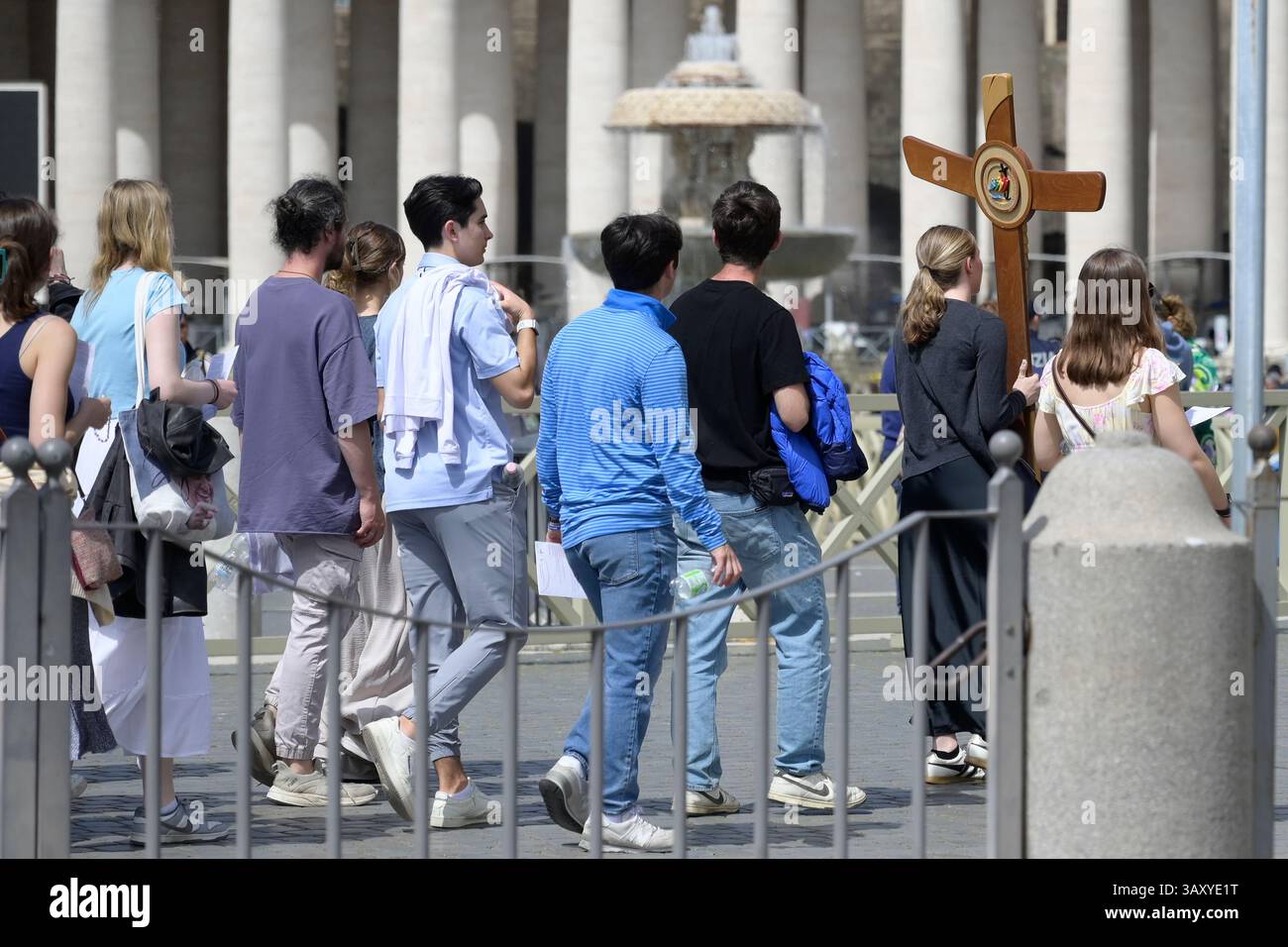 Rome, Italy. 21st Apr, 2025. The faithful march with a cross at St ...