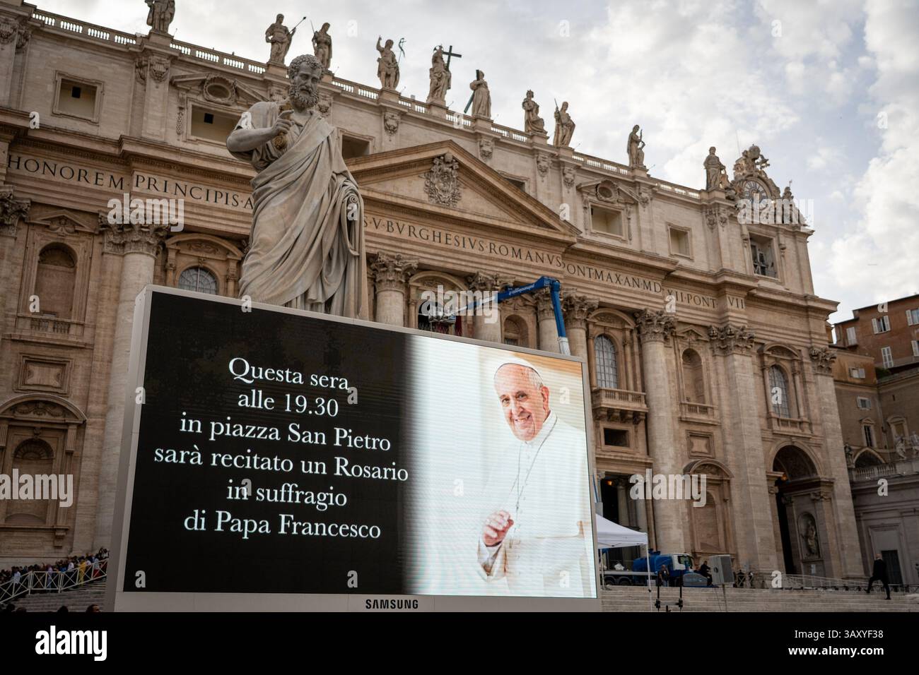 Vatican City, Vatican. 21st Apr, 2025. A banner seen with an image of ...