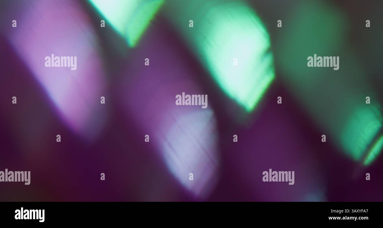 Abstract laser light. Blur shine background. Defocused purple green ...