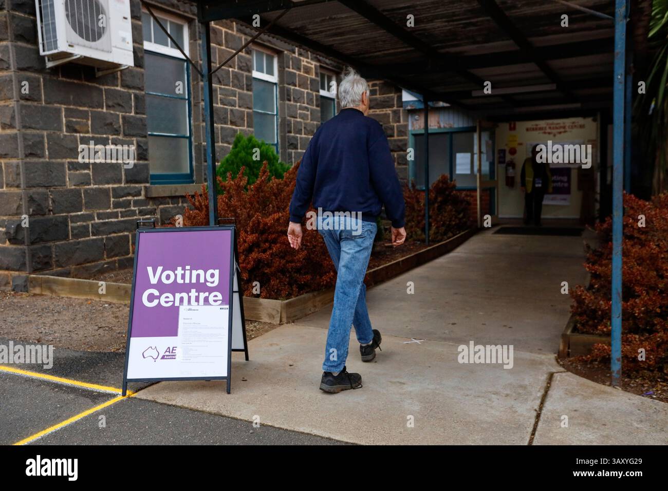 Melbourne, Australia. 22 April, 2025. A man walks into the voting ...